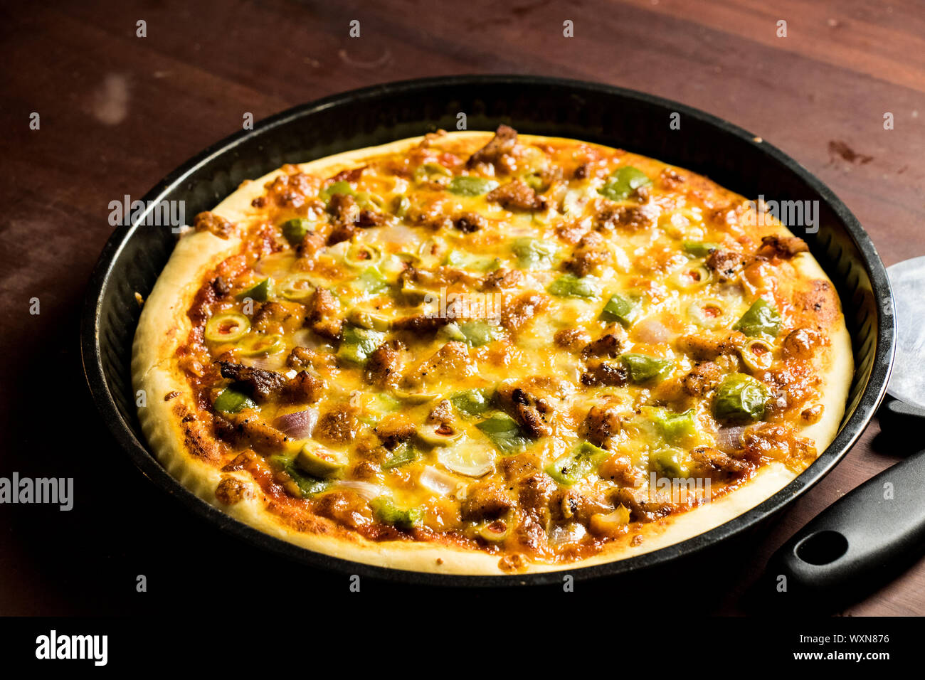 Pan Pizza take from very closeup Stock Photo - Alamy