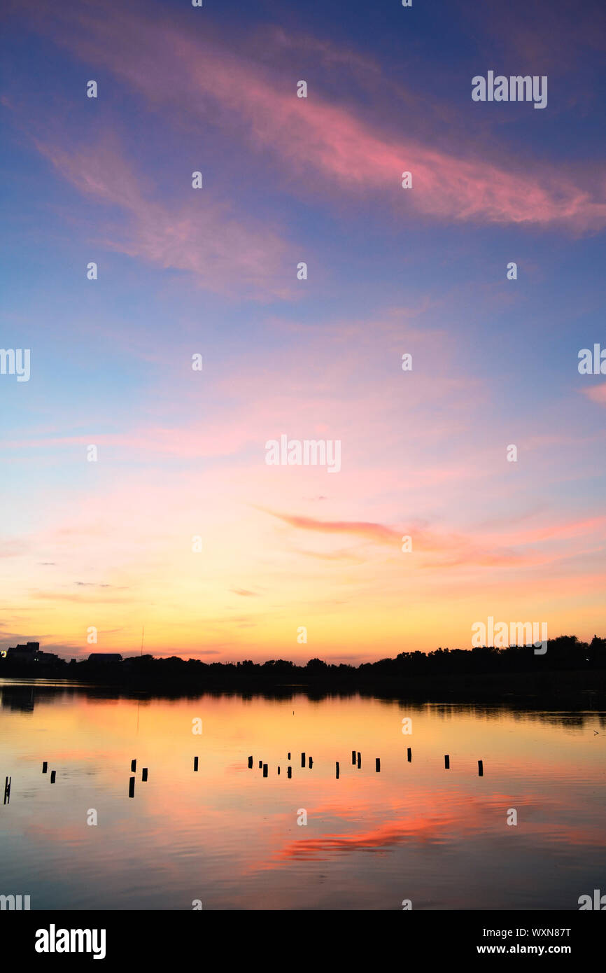 Sunset at the river with Colorful sky Stock Photo - Alamy