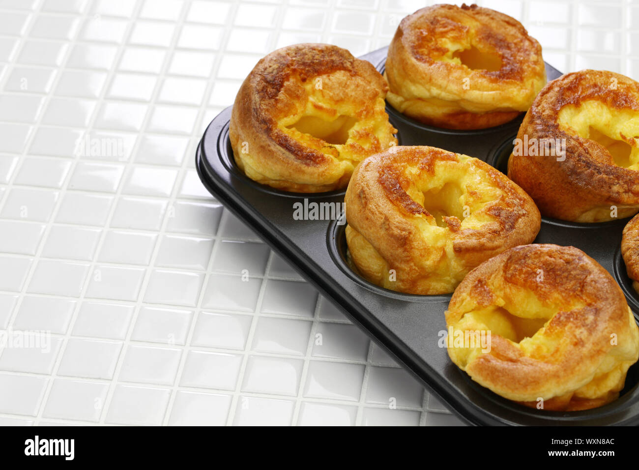 homemade freshly Yorkshire puddings, traditional British side dish ...