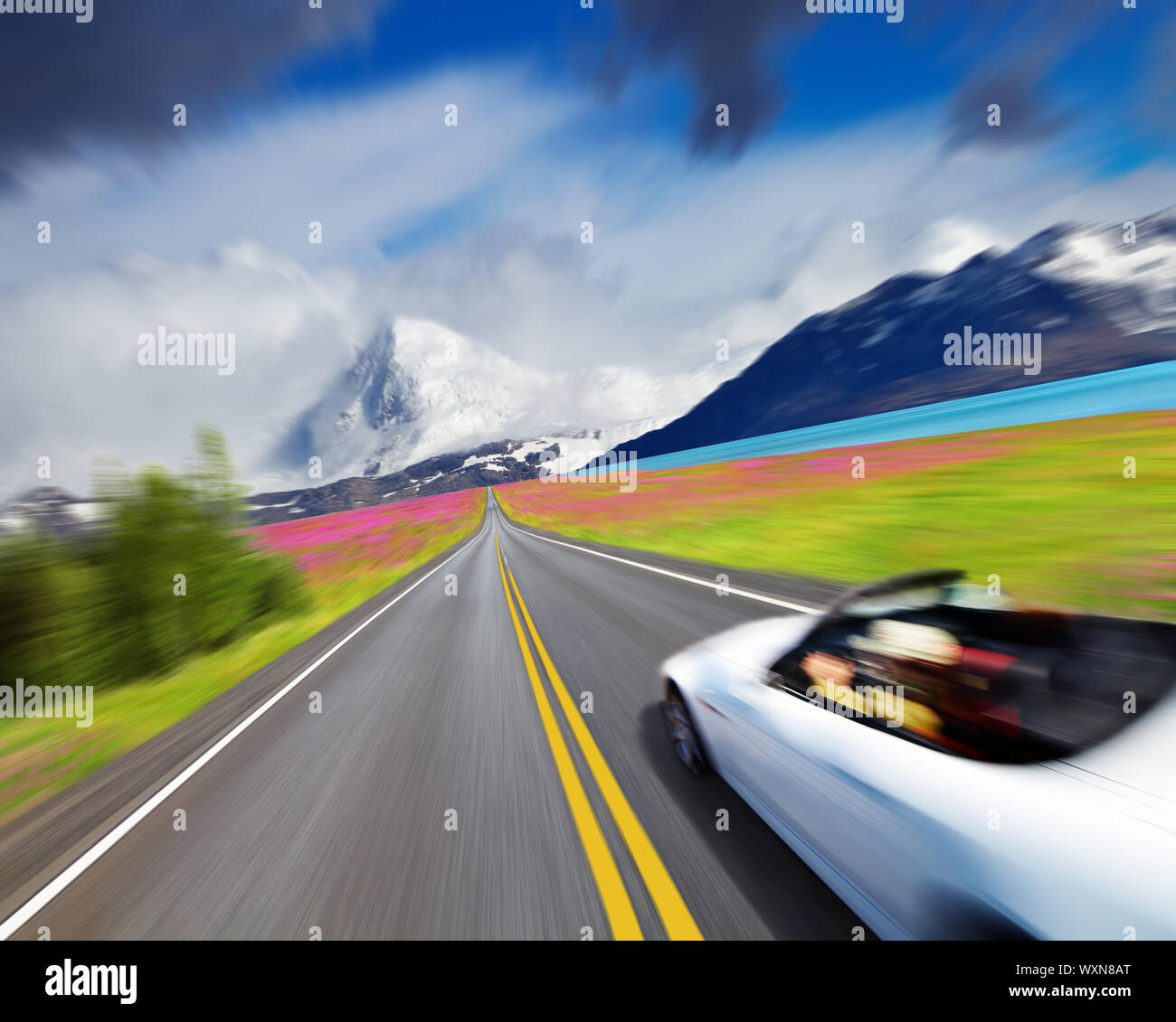 Mountain landscape with road and sports car in motion blur Stock Photo ...