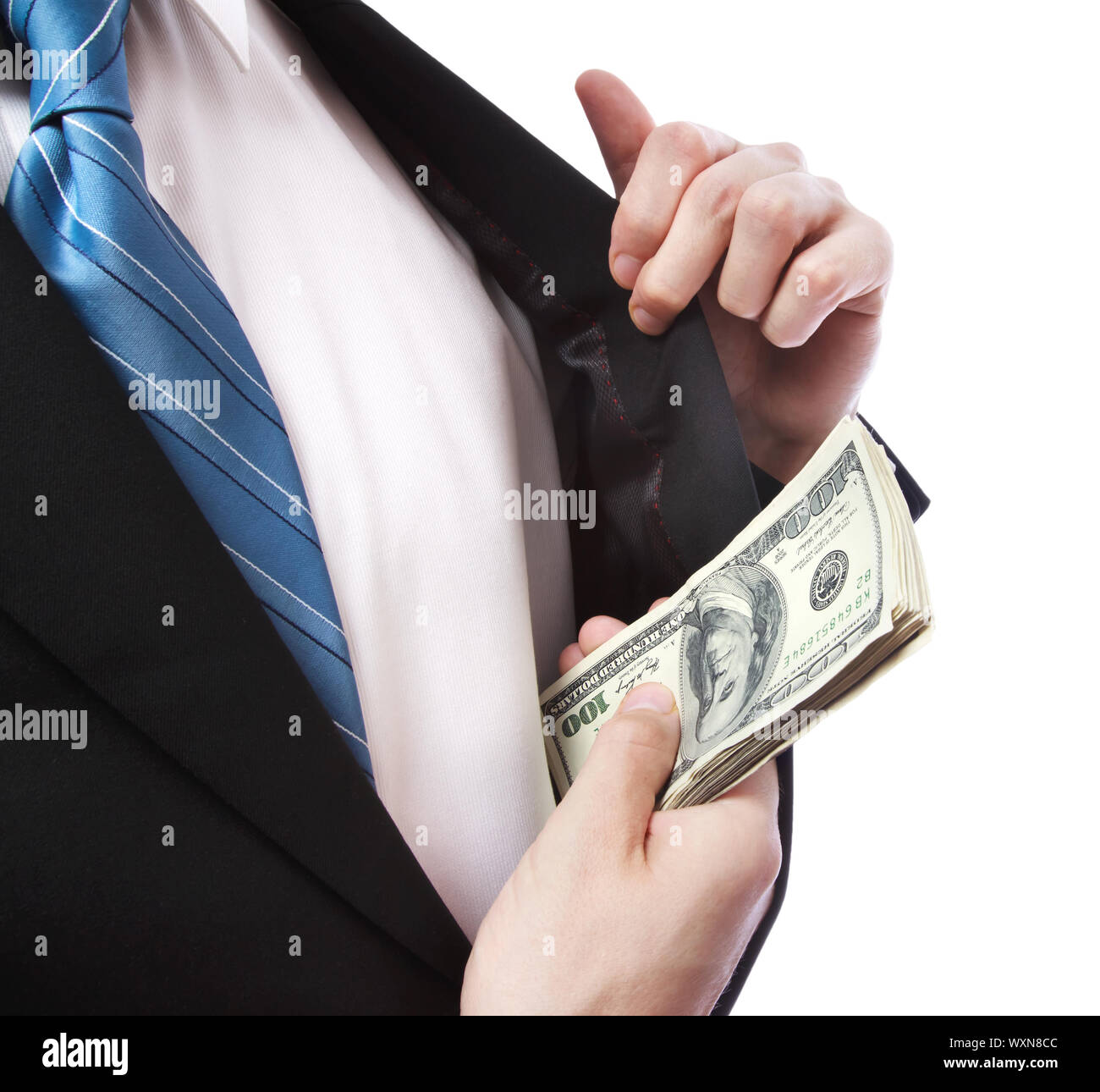 Man putting 100 dollar bills into suit hi-res stock photography and ...