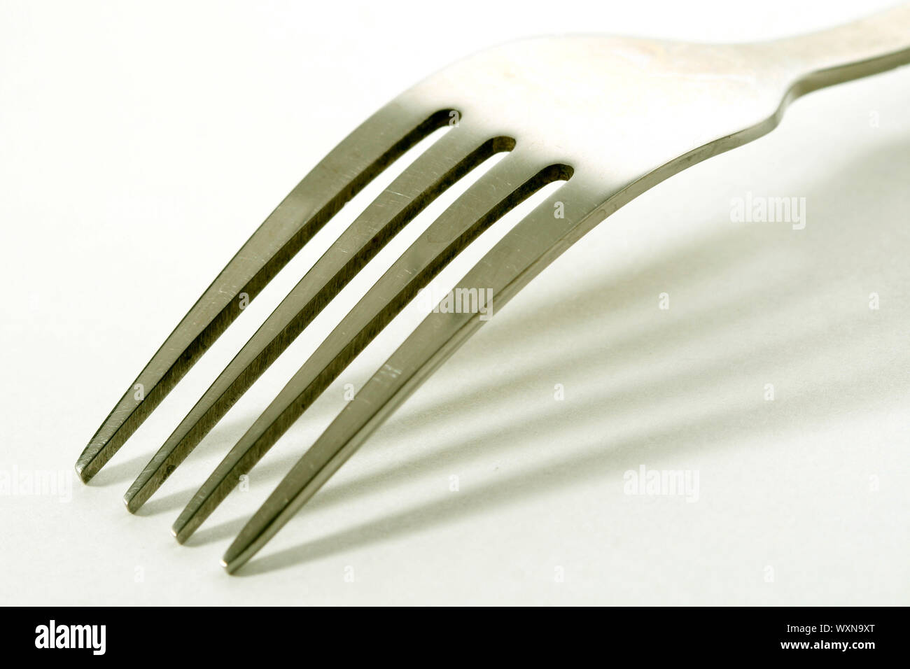 fork macro close up diner background Stock Photo - Alamy
