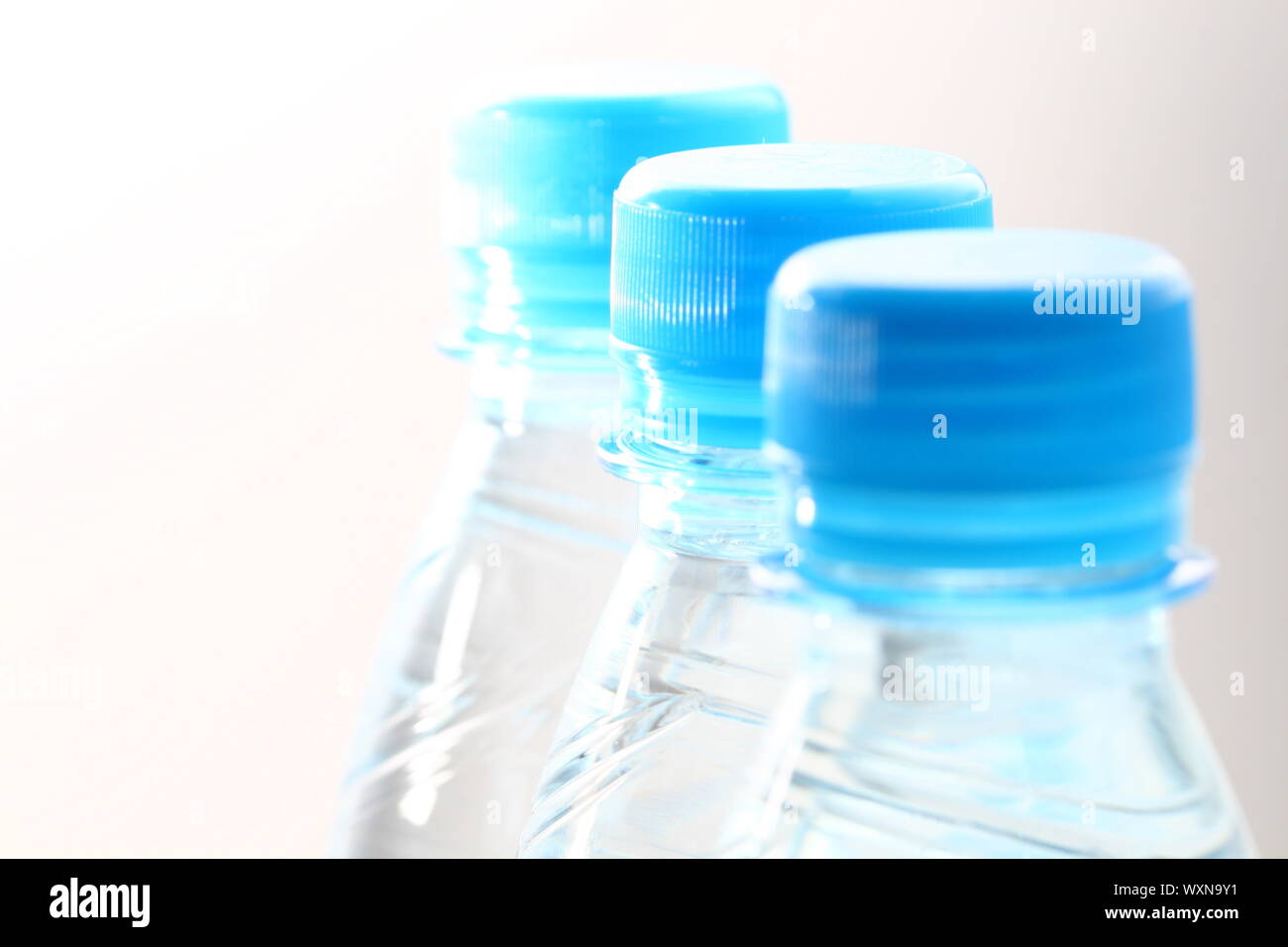 clear cold blue water in bottle Stock Photo - Alamy