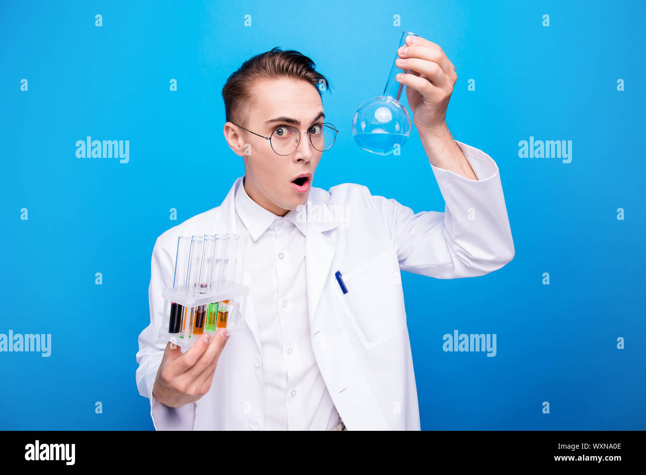 Portrait handsome young pharmacist chemist hi-res stock photography and ...