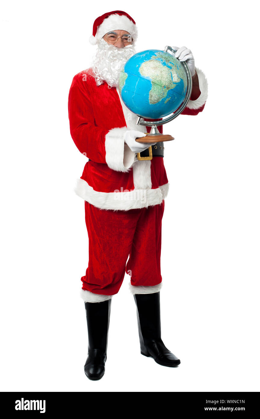 Santa holding globe Cut Out Stock Images & Pictures - Alamy