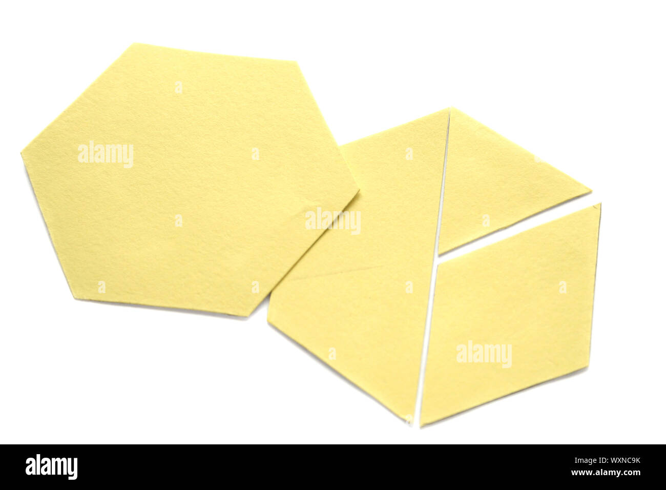 Cut from cardboard, the hexagon can be further cut to a triangle, a ...