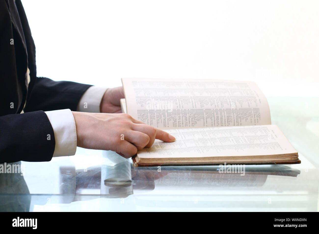 hands take the book on white Stock Photo - Alamy