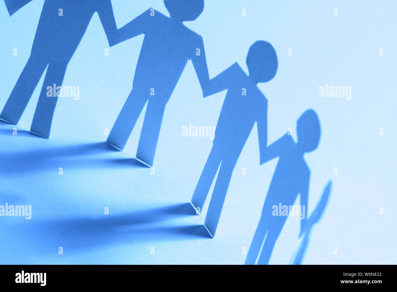 paper team linked together partnership concept Stock Photo - Alamy paper team linked together partnership concept Stock Photo - Alamy