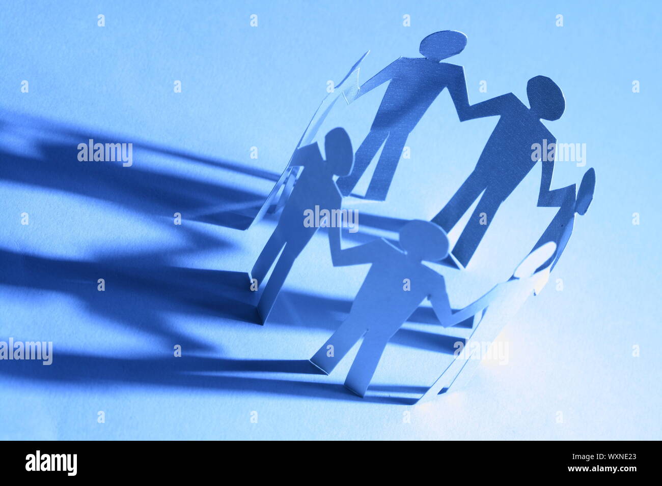 paper team linked together partnership concept Stock Photo - Alamy paper team linked together partnership concept Stock Photo - Alamy