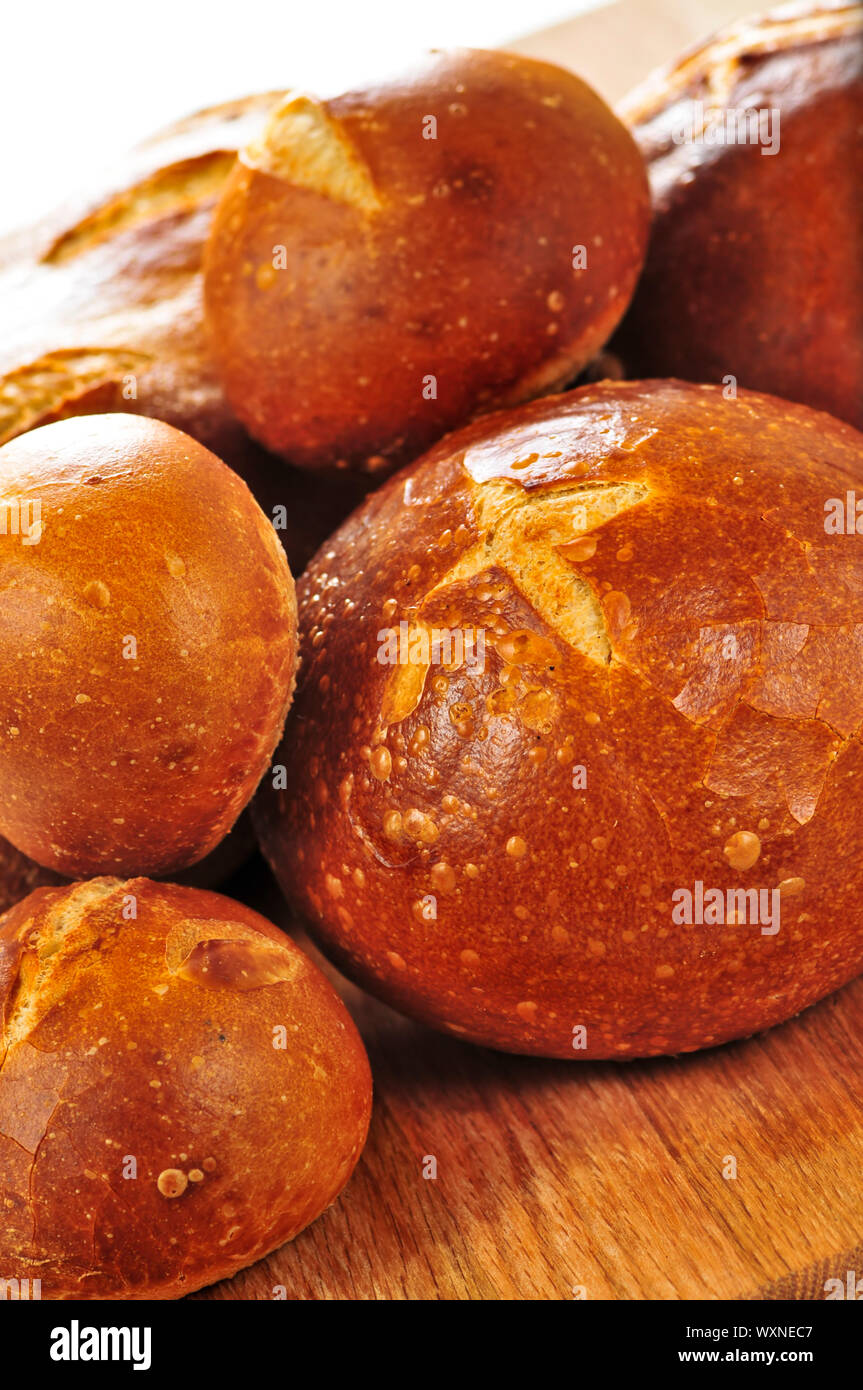 Small and large round loaves of sourdough bread Stock Photo - Alamy