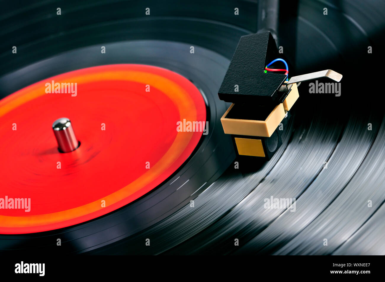 Vinyl record spinning on turntable close up Stock Photo - Alamy