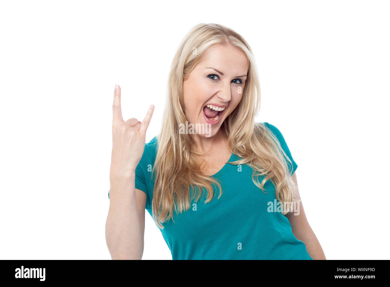 Trendy woman doing a rock symbol over white Stock Photo - Alamy