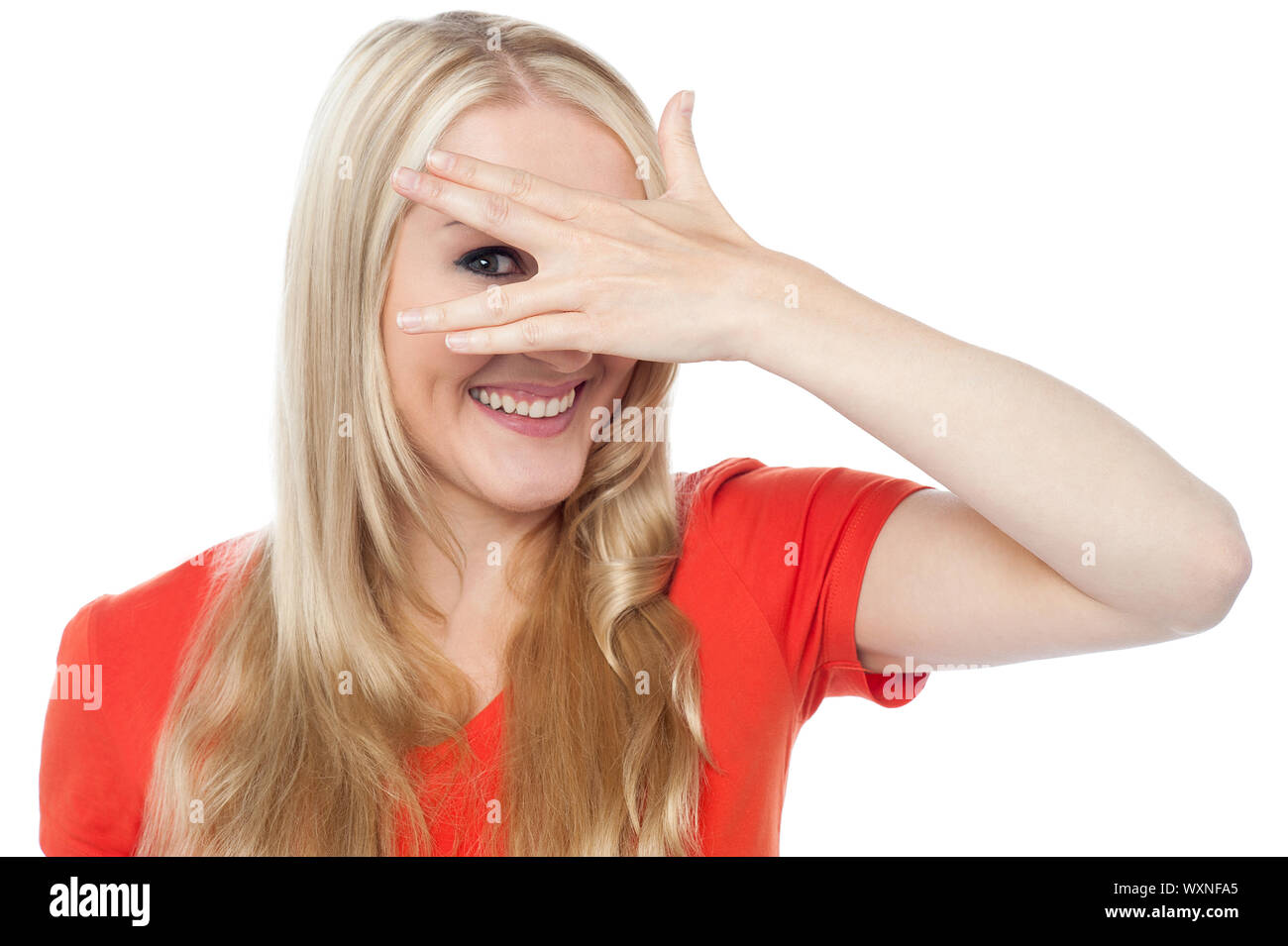 Portrait of young woman hiding her face Stock Photo - Alamy