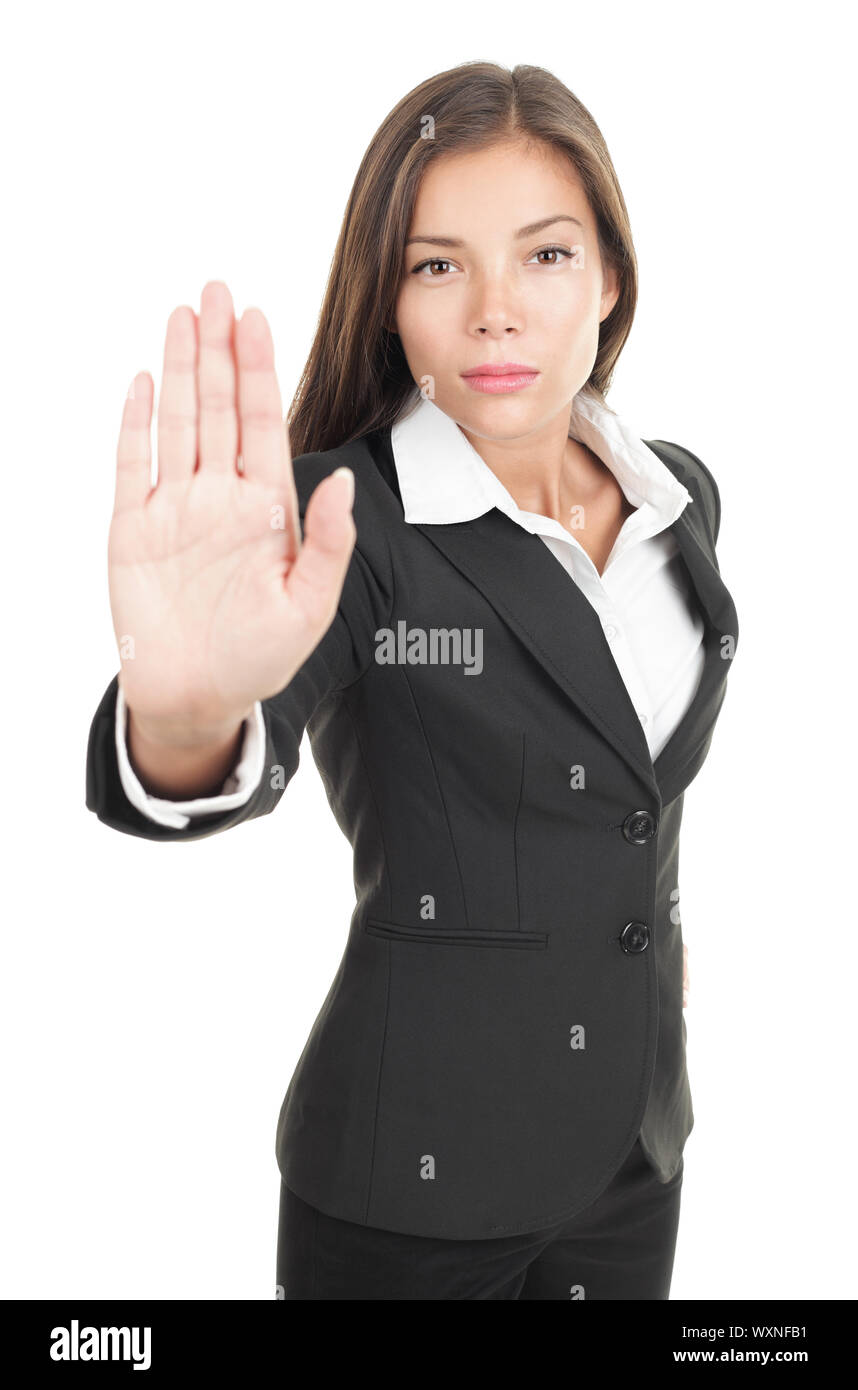 Serious businesswoman making stop sign on white background, focus on ...
