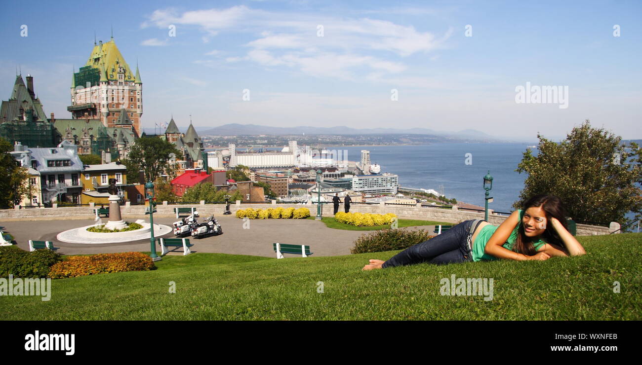 Girl enjoying the summer in Quebec City with Chateau Frontenac in the ...