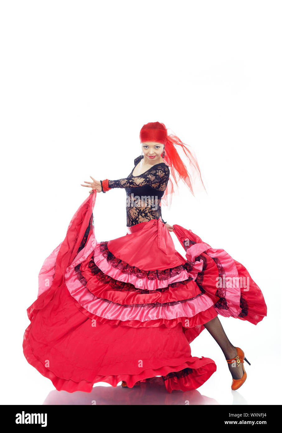 Lady dancing flamenco in traditional costume Stock Photo - Alamy