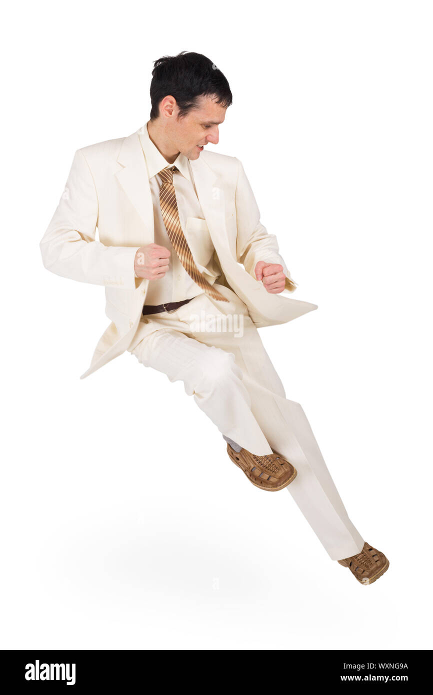 A man in a dynamic pose - high jump on white Stock Photo - Alamy