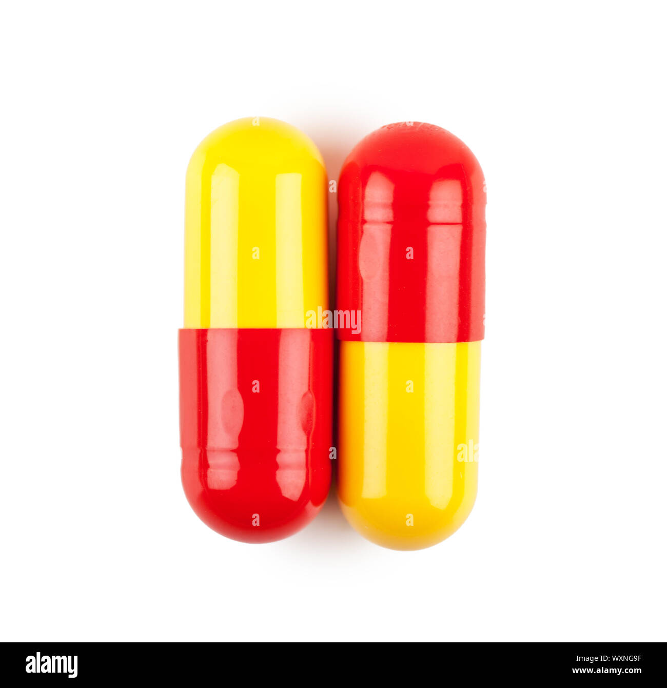 Macro view of capsule pilsl over white background Stock Photo - Alamy