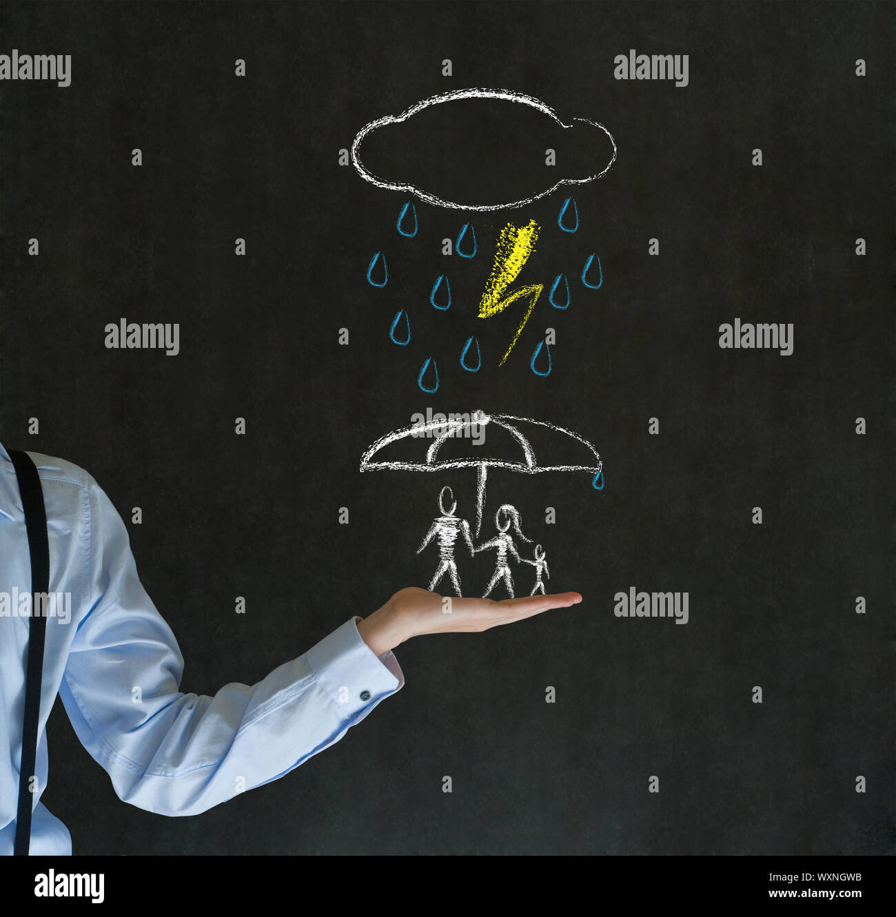 Insurance businessman holding out hand protecting family from natural ...