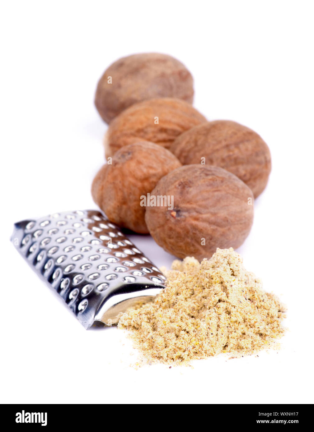 Heap of Powder Nutmeg, Grater and Nutmeg Full Body isolated on white ...