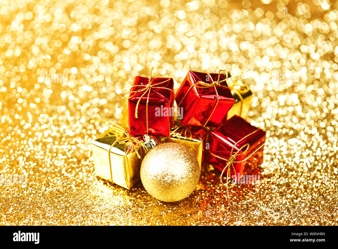 Christmas gift box with christmas balls on shiny background Stock Photo ...