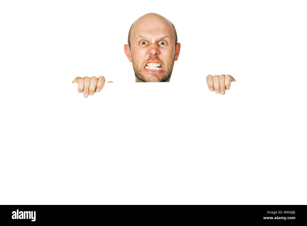 Man peeking over wall hi-res stock photography and images - Alamy