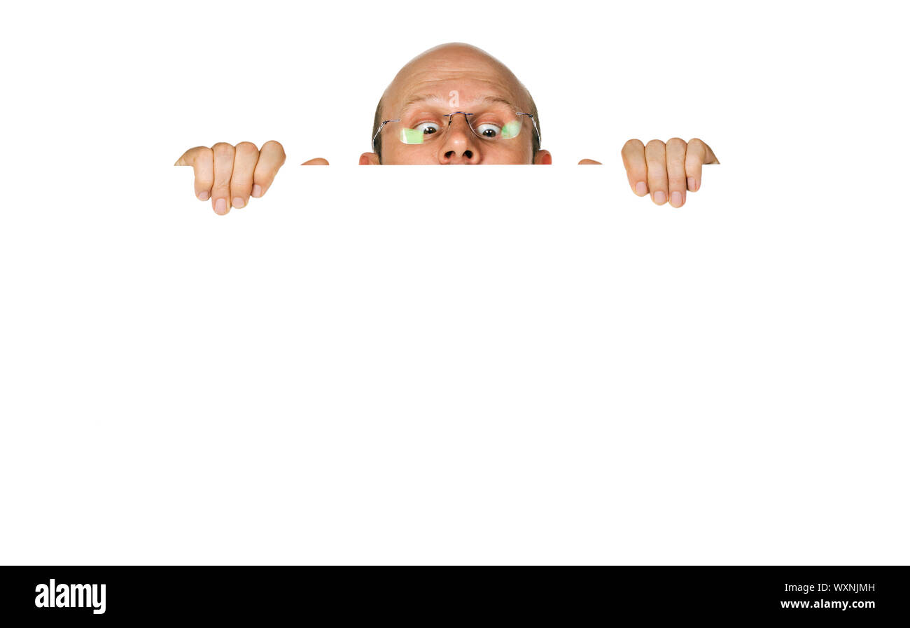 Man peeking over wall hi-res stock photography and images - Alamy