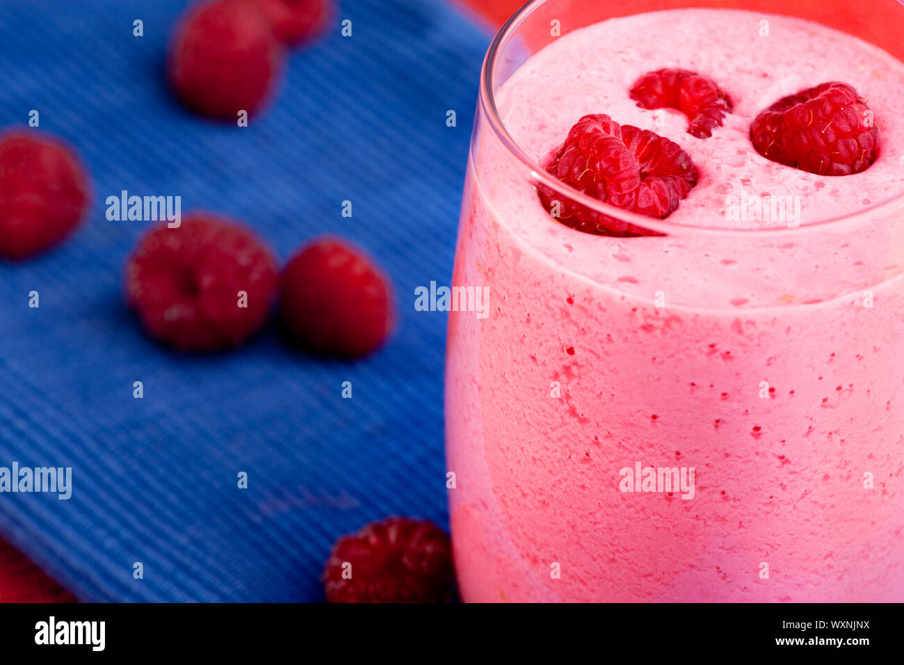 A cool raspberry smoothie detail Stock Photo - Alamy