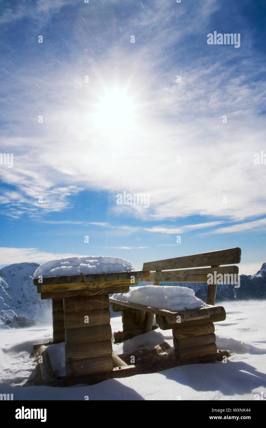 Bench in winter landscape Stock Photo - Alamy