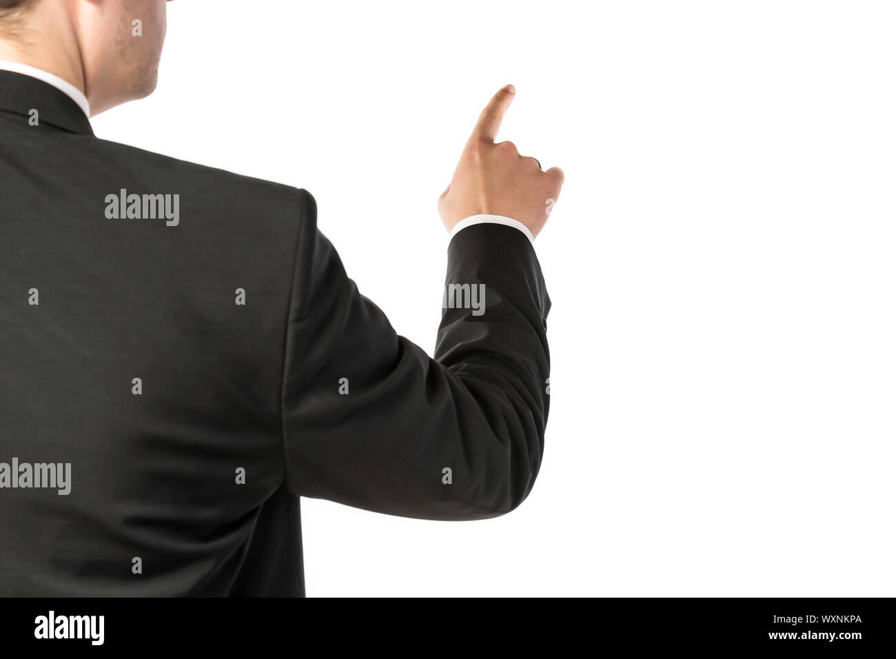 Back of a businessman pointing with his finger Stock Photo - Alamy