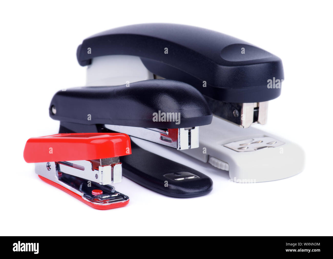 Three Staplers in a Rownisolated on white background. Side View Stock ...