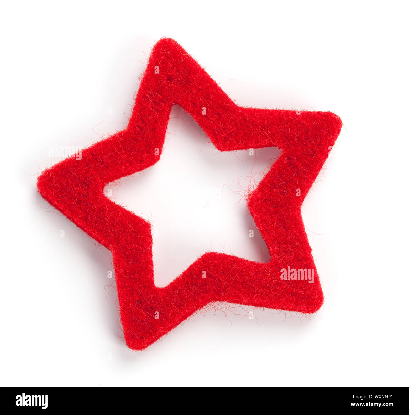 Red star shaped christmas decoration, on white Stock Photo - Alamy