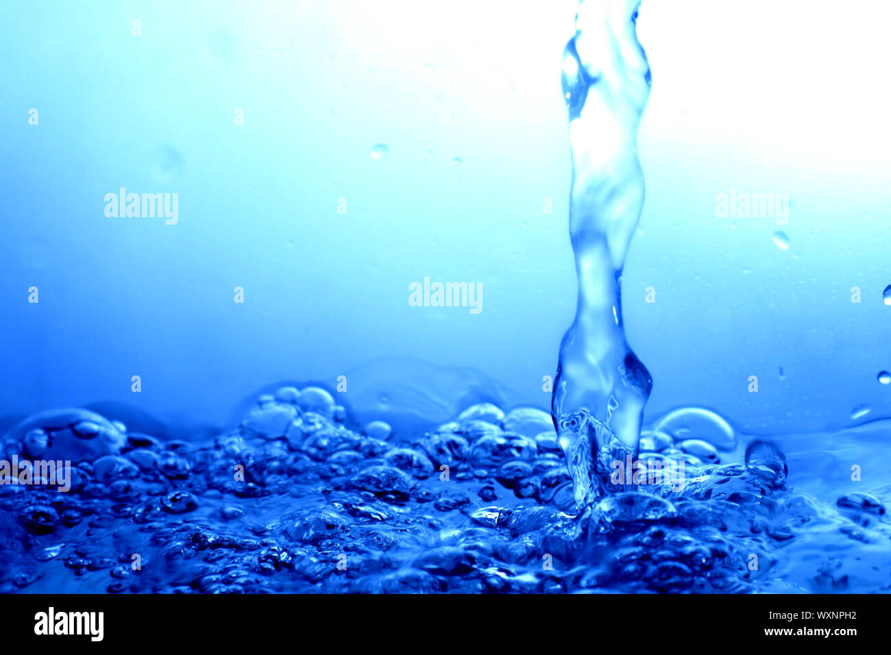 great blue water splash close up macro Stock Photo - Alamy