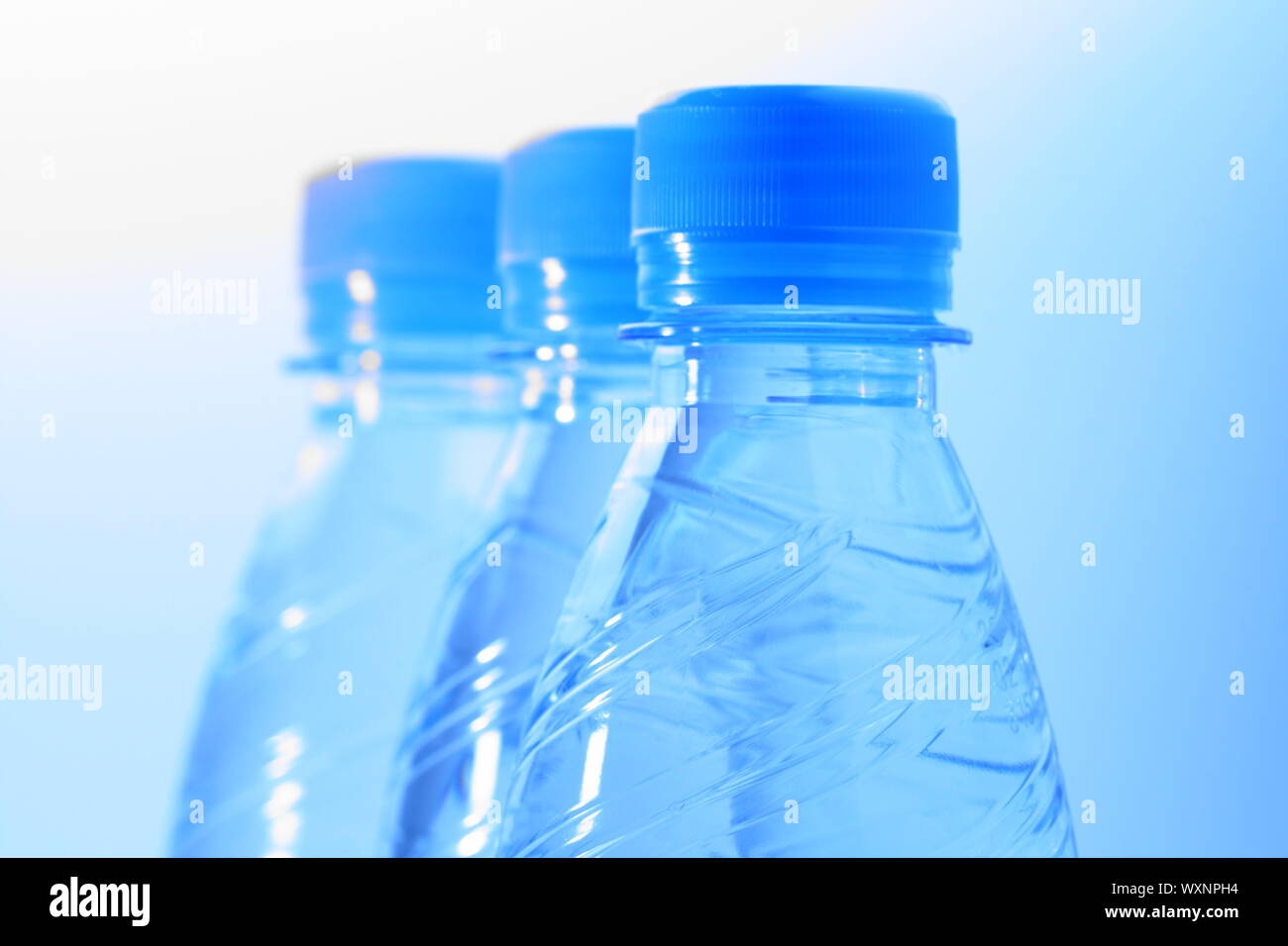 clear cold blue water in bottle Stock Photo - Alamy