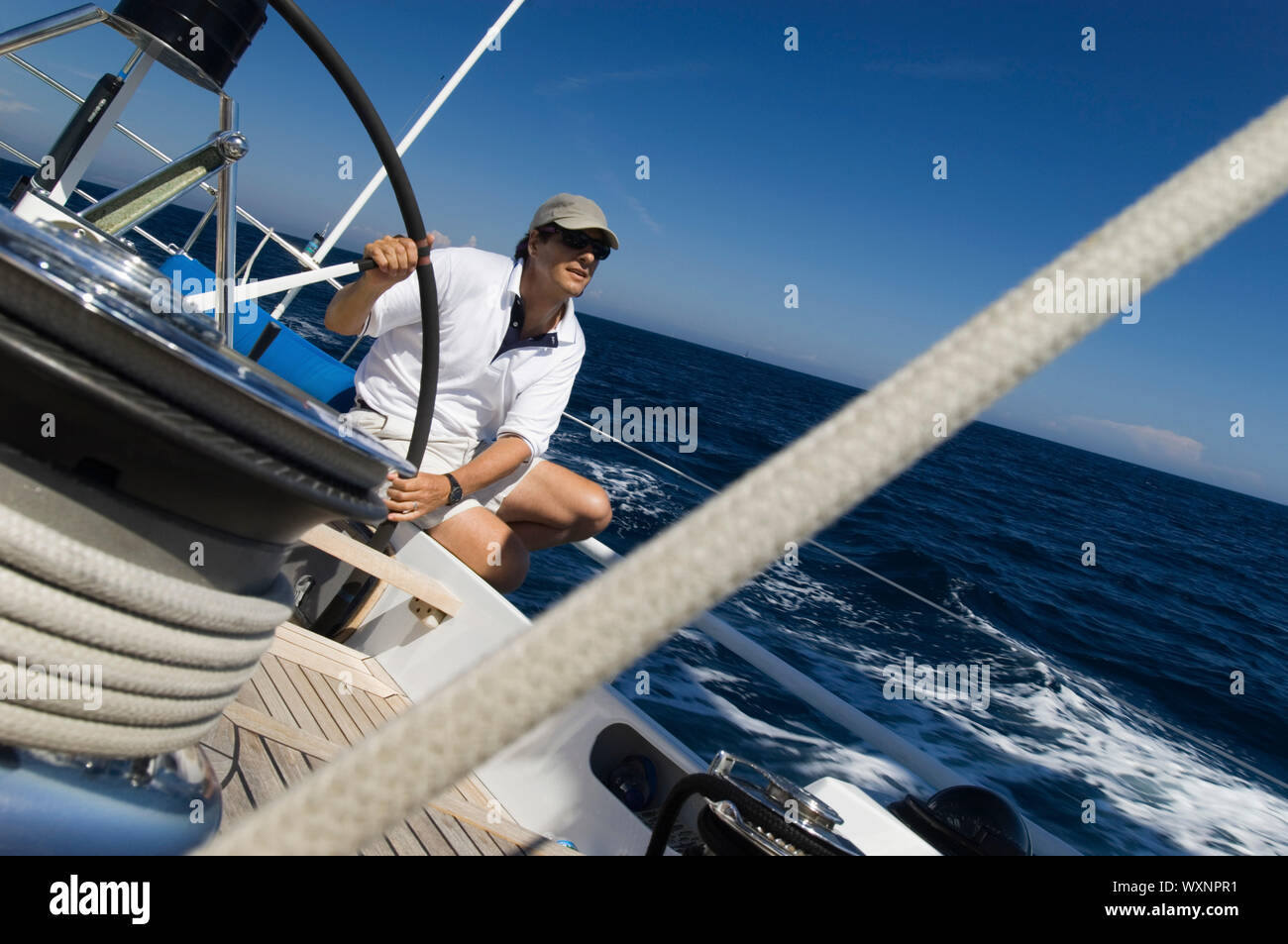 Sailor at the Helm During Sailing Yacht Race Stock Photo - Alamy