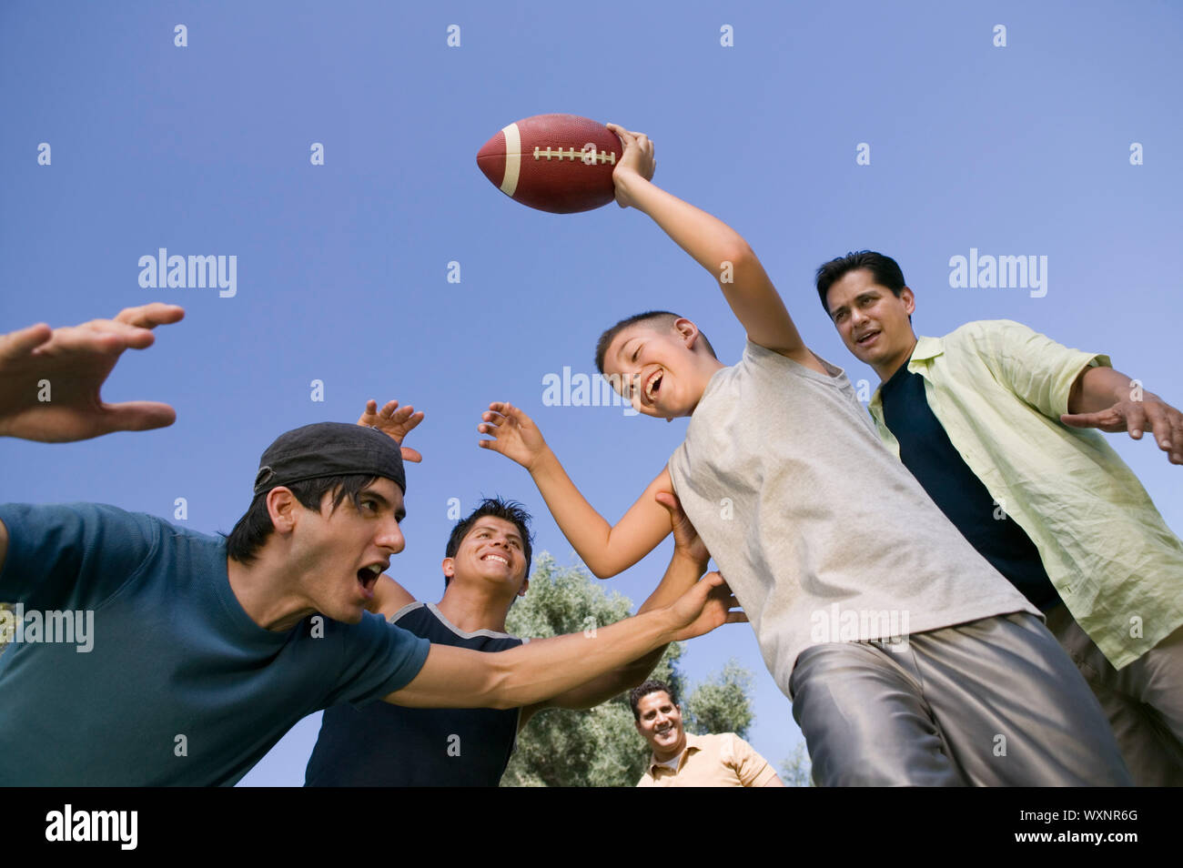 Kids playing with footballs hi-res stock photography and images - Alamy