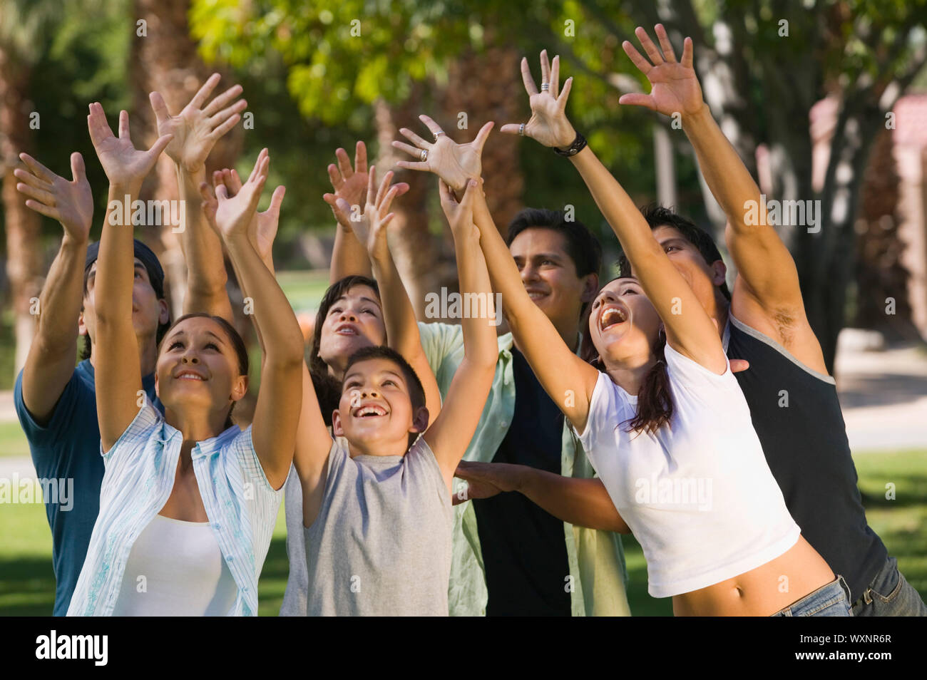 People Waiting to Catch an Object Stock Photo - Alamy