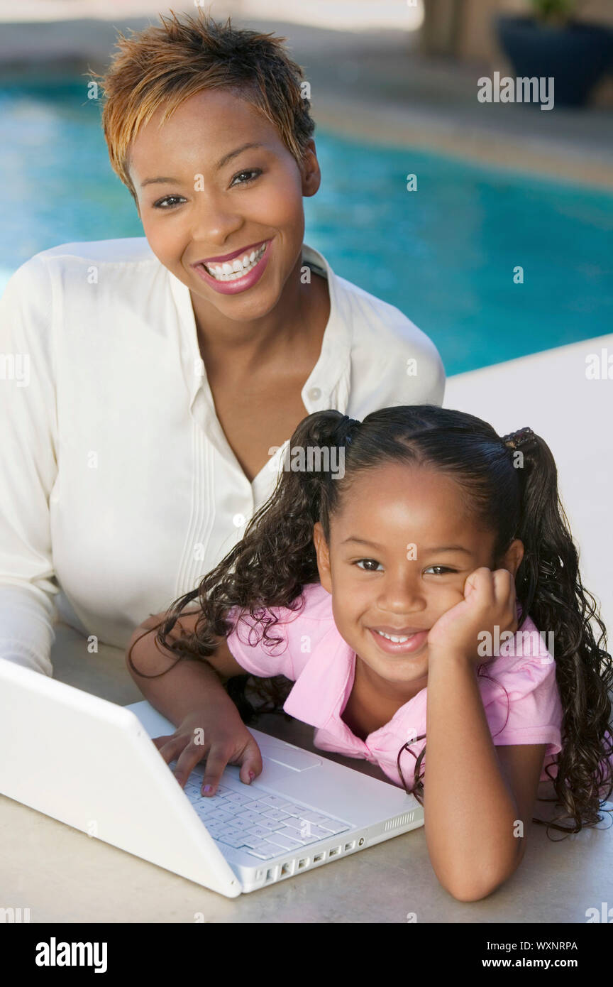 Mother Teaching Daughter Computer Skills Stock Photo - Alamy