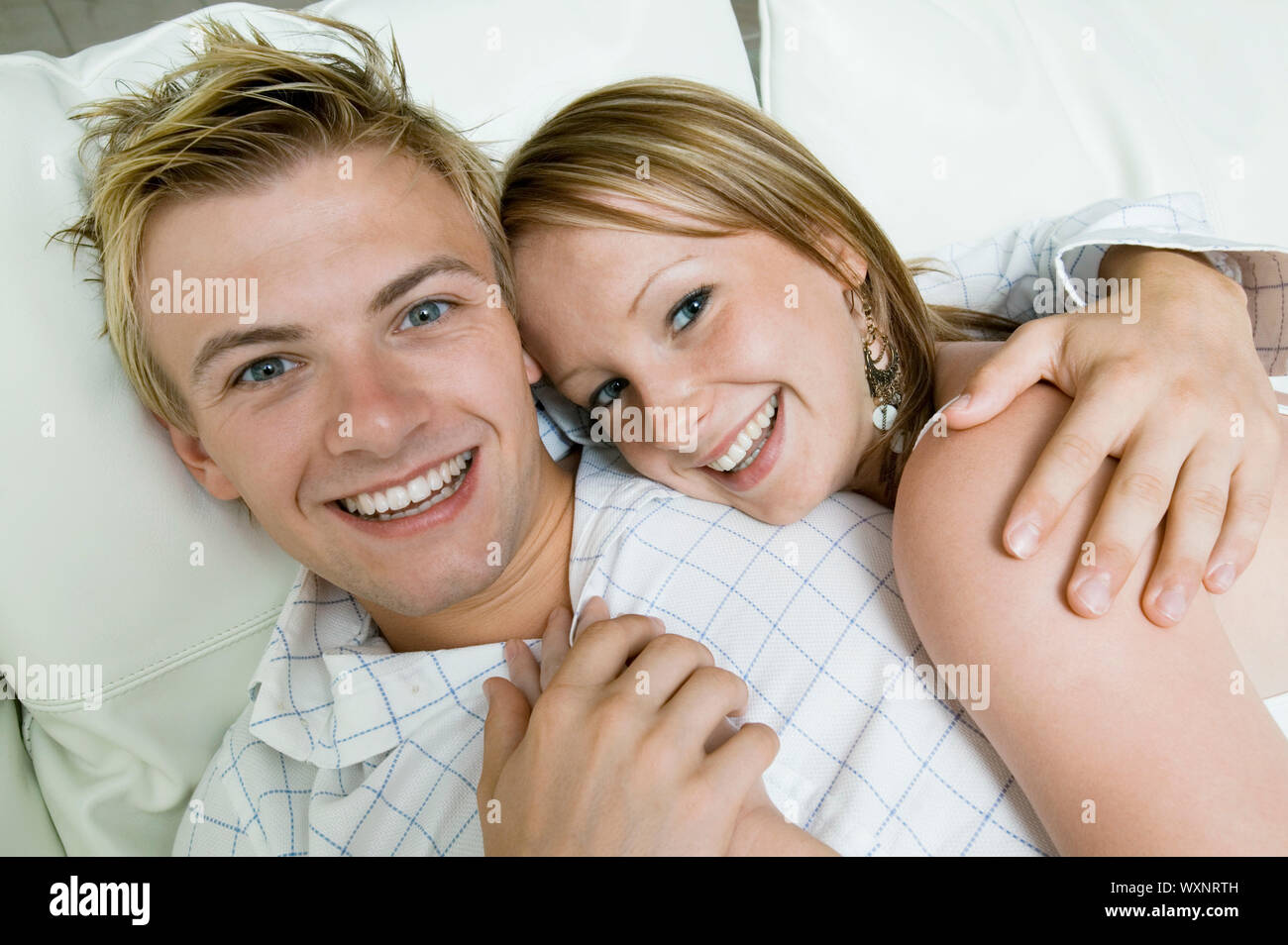 Two guys girl bed hi-res stock photography and images - Alamy