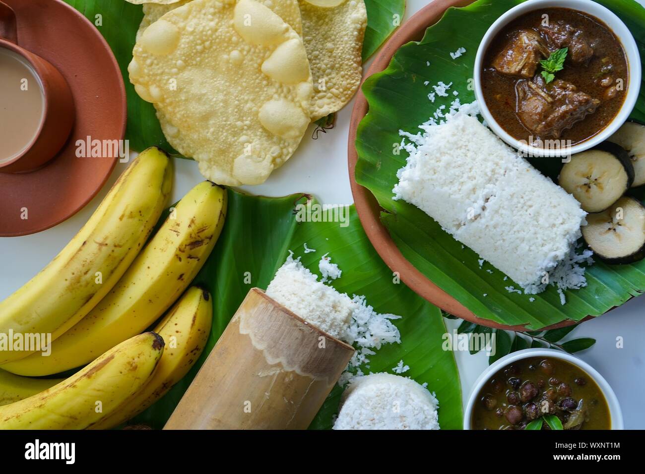 Kerala breakfast rice Puttu /Pittu made in bamboo mould served with ...