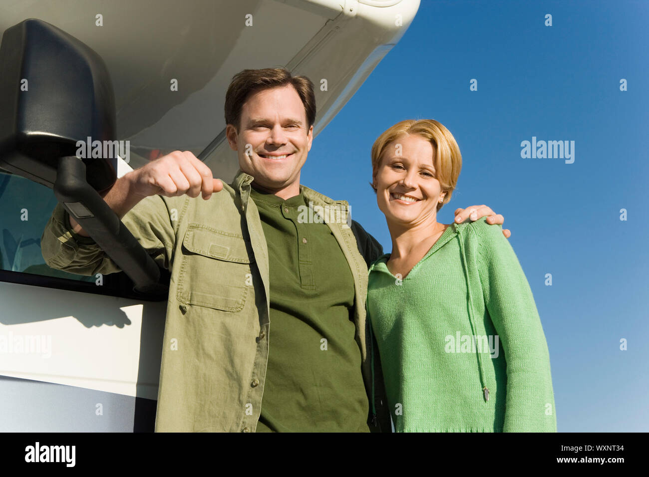 Couple with Their RV Stock Photo - Alamy
