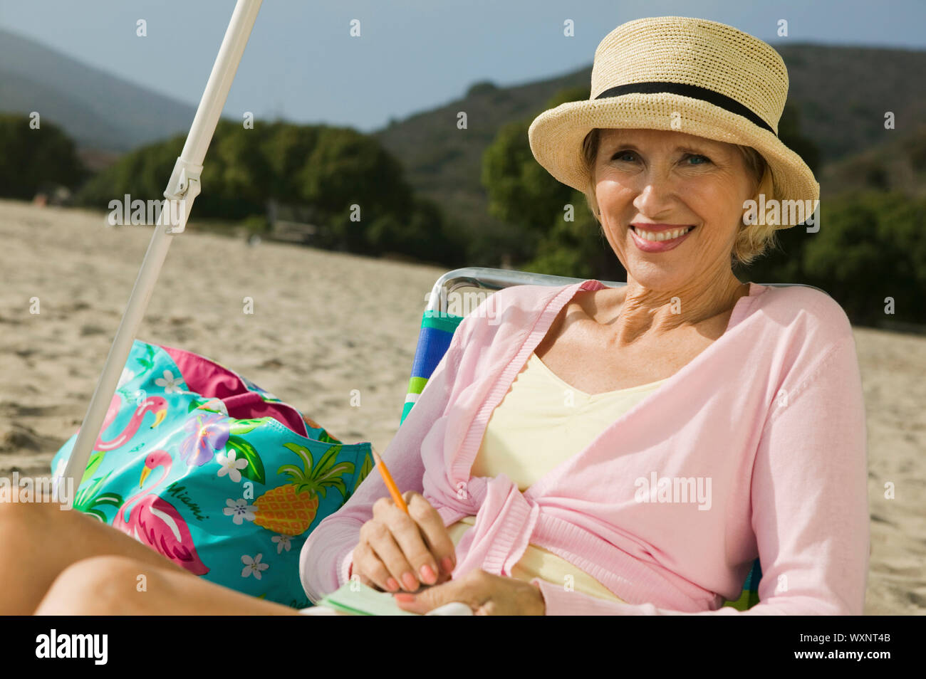 Woman at the Beach Stock Photo - Alamy
