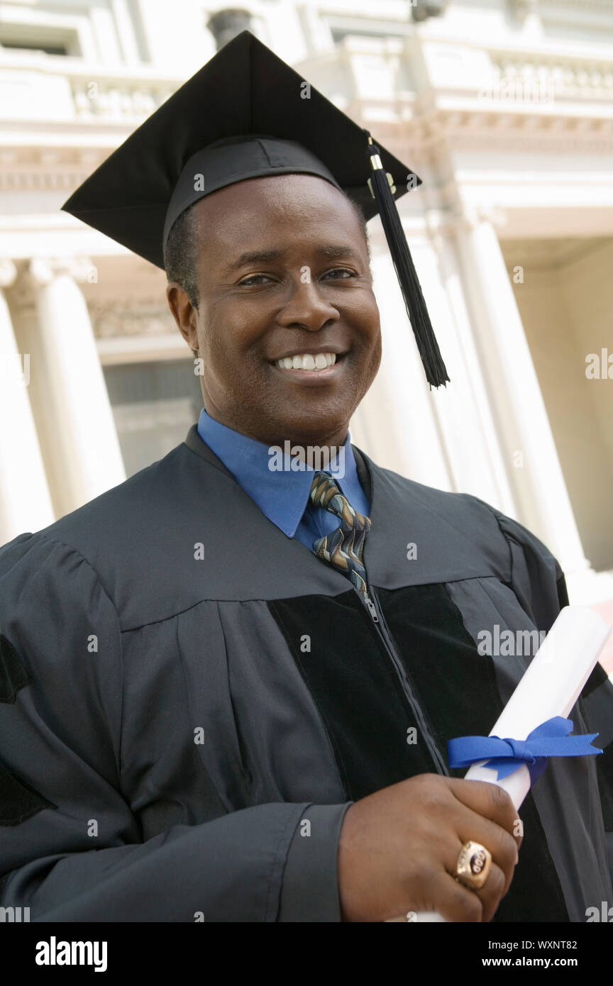 Happy graduates posing in hi-res stock photography and images - Alamy