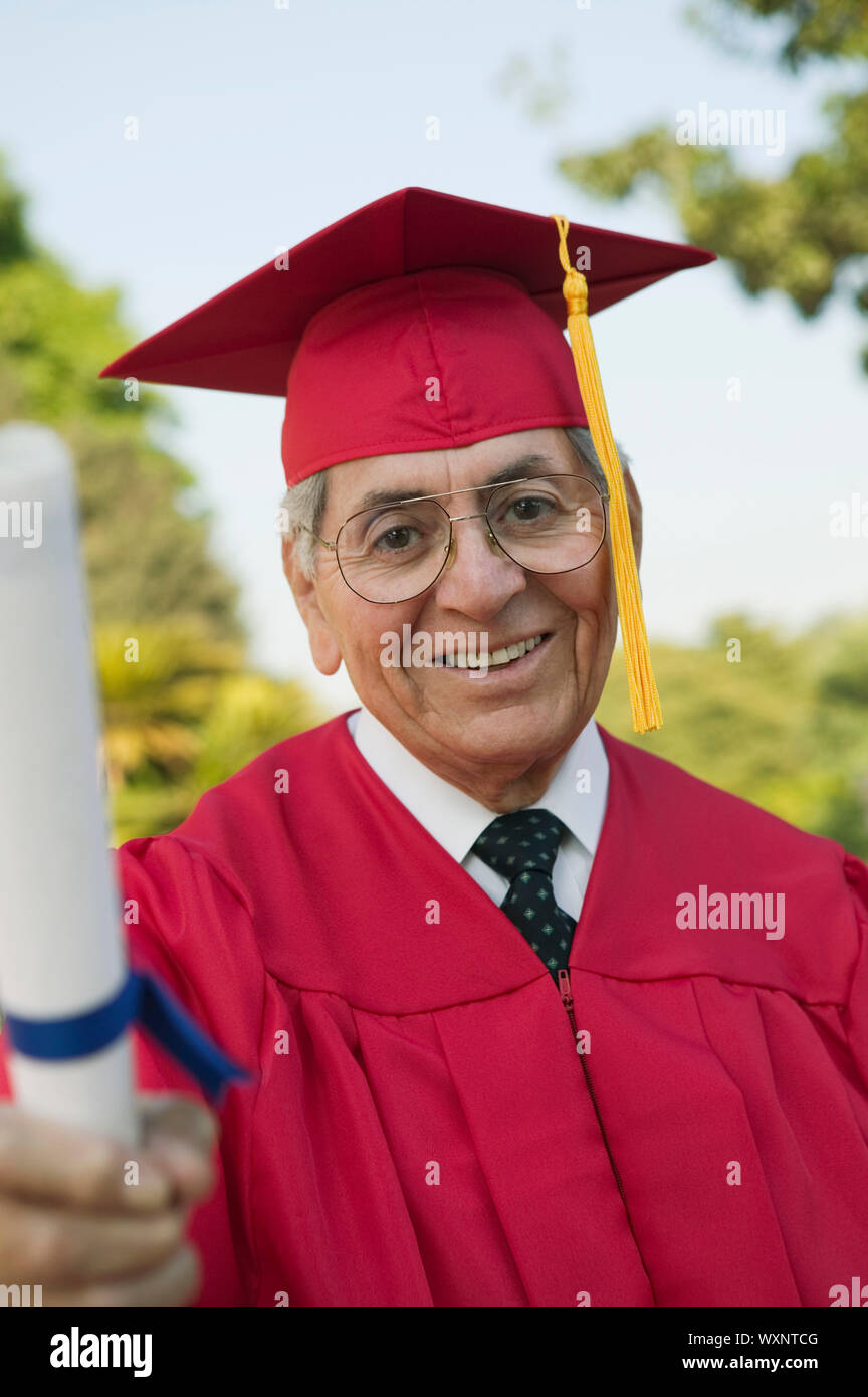 Senior Graduate with Diploma Stock Photo - Alamy
