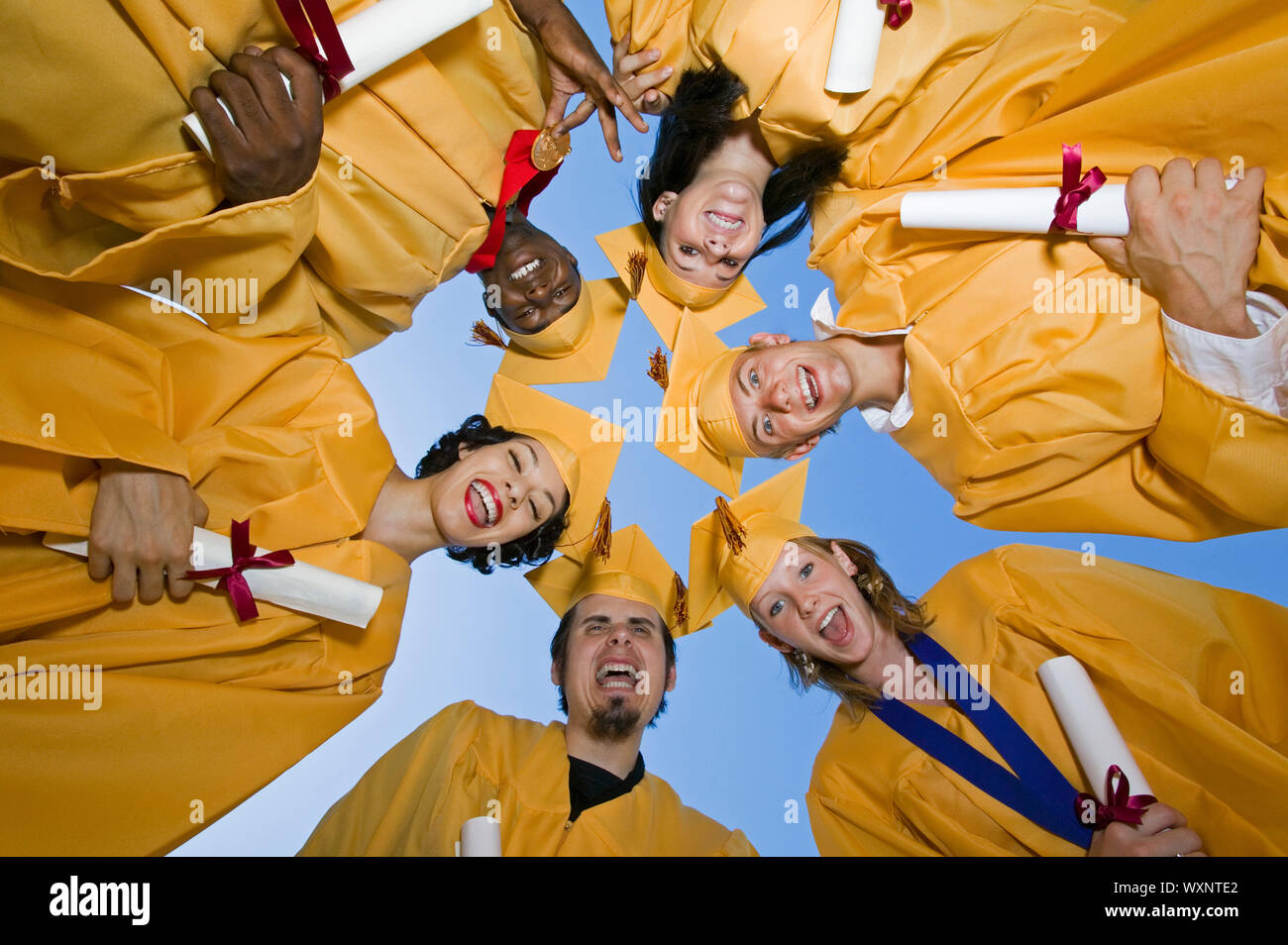 Graduates in a Circle Stock Photo - Alamy