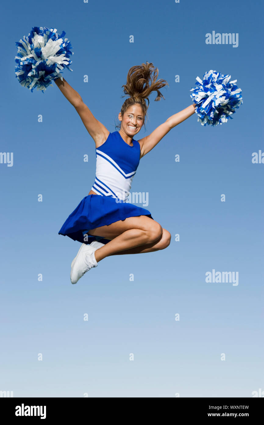 Cheerleader girls action hi-res stock photography and images - Alamy