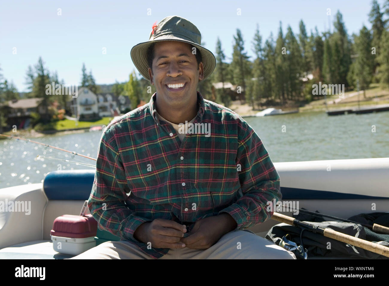Attractive Man Fishing Stock Photo - Alamy