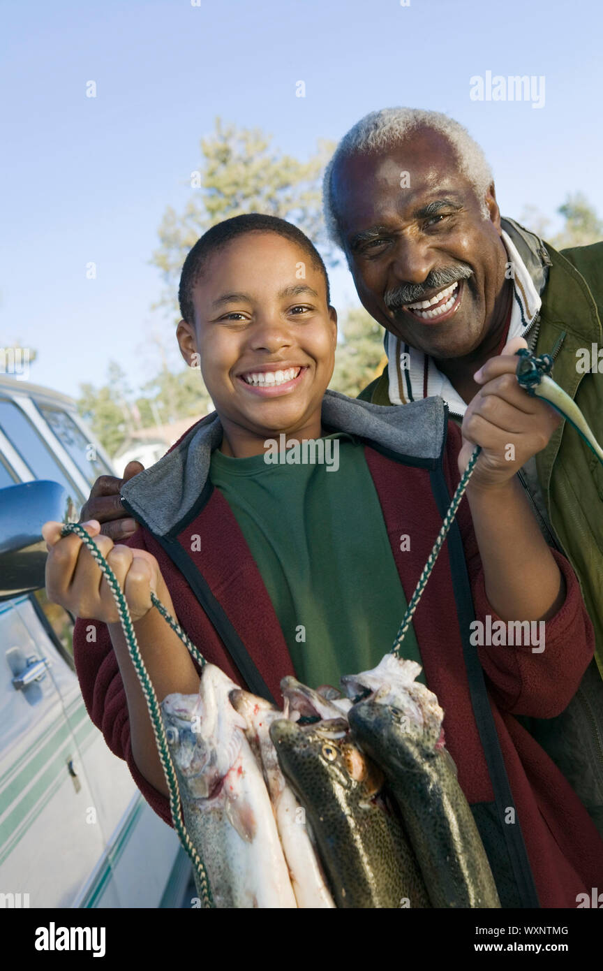 Older man boy fishing hi-res stock photography and images - Alamy