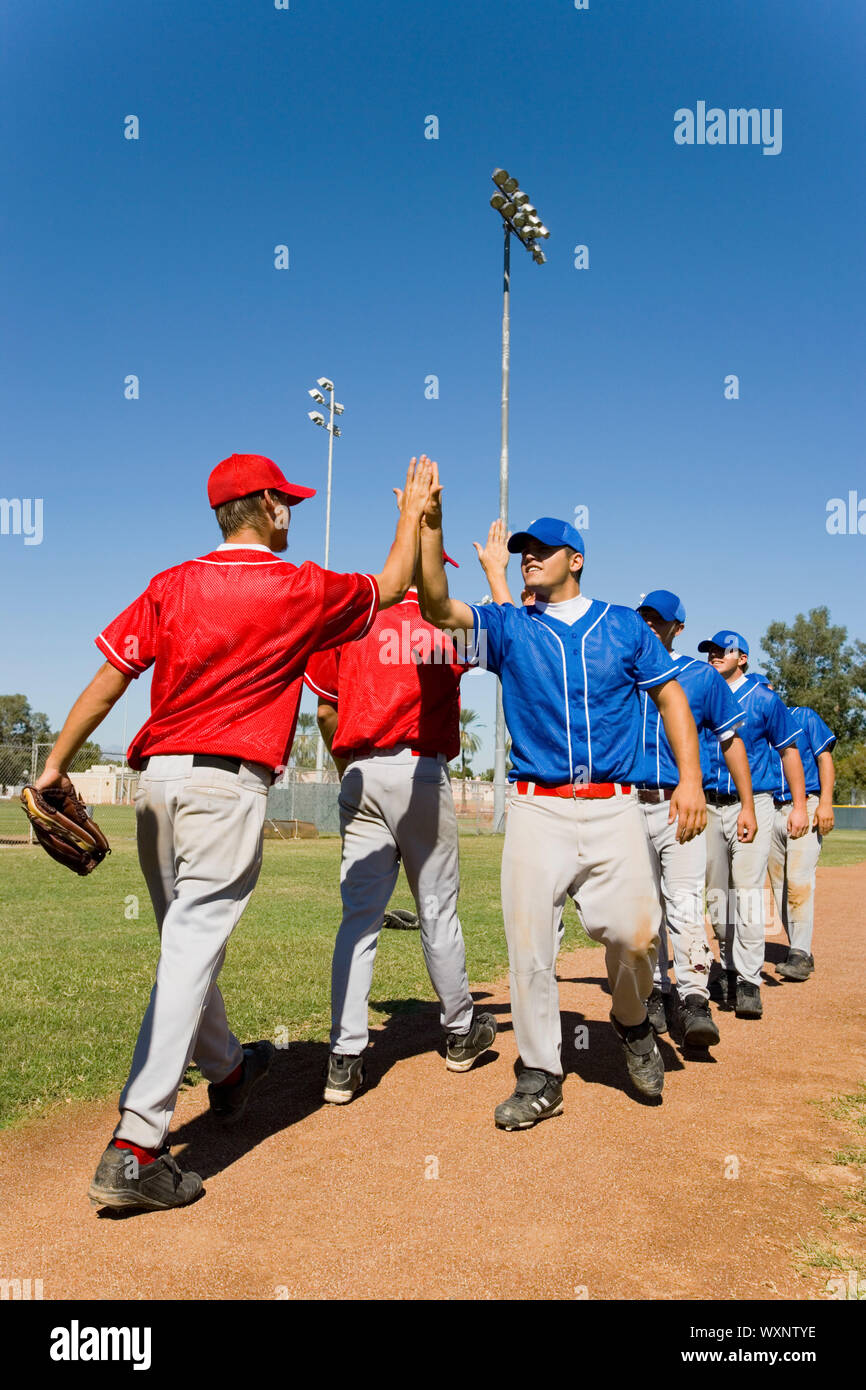 Teams High-Fiving Each Other Stock Photo - Alamy