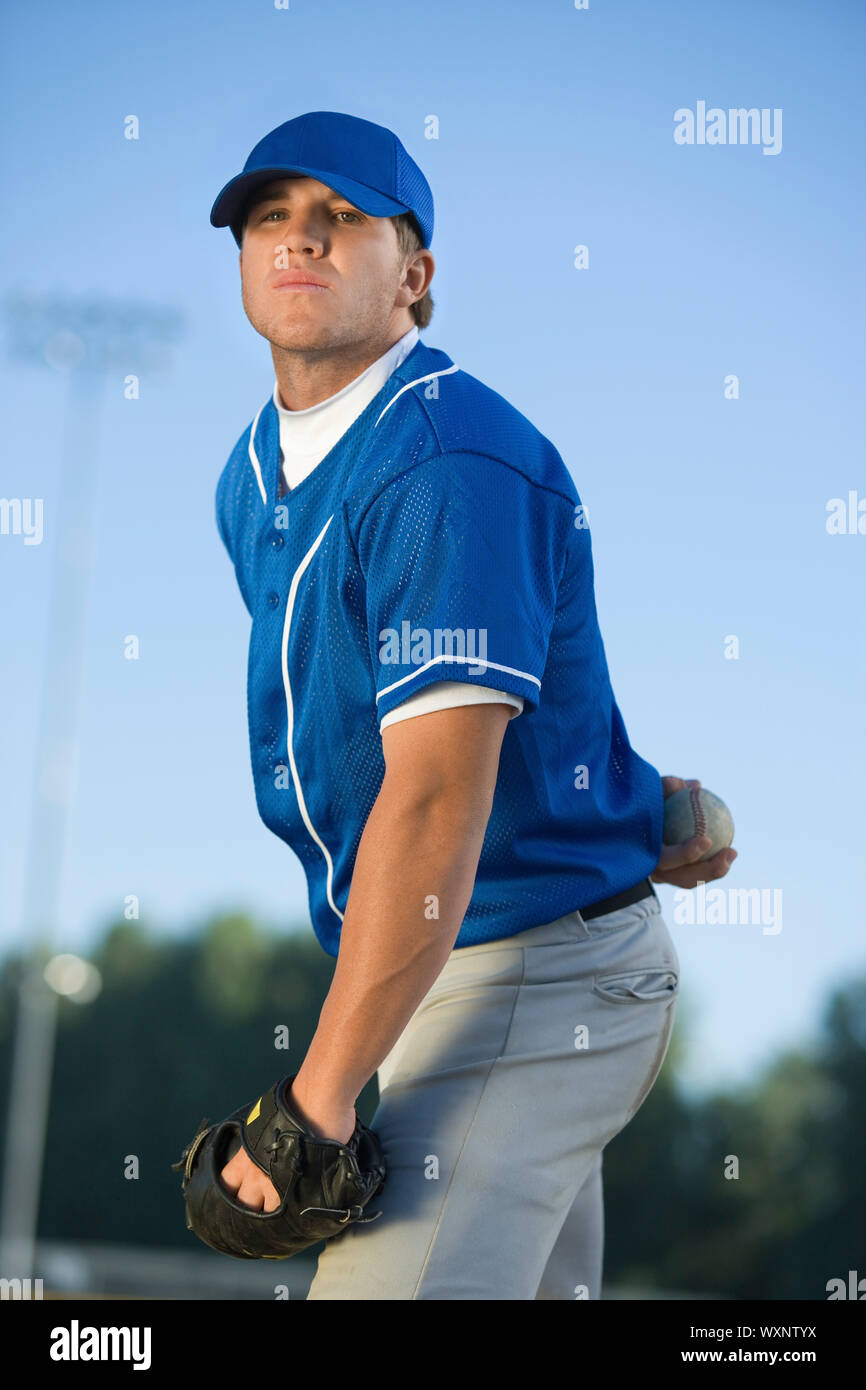 Teen boy pitching baseball hi-res stock photography and images - Alamy